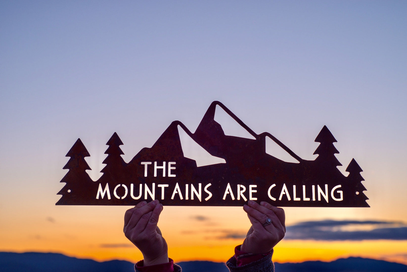The Mountains Are Calling metal sign – Twisselman Trading Co